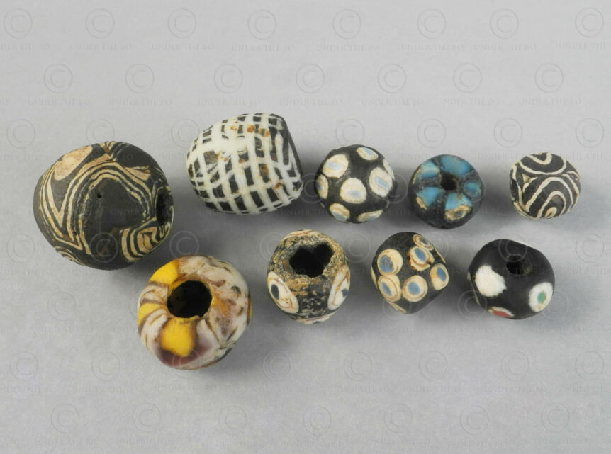Group of nine glass paste beads 22SH9. Found in Afghanistan. Islamic ...